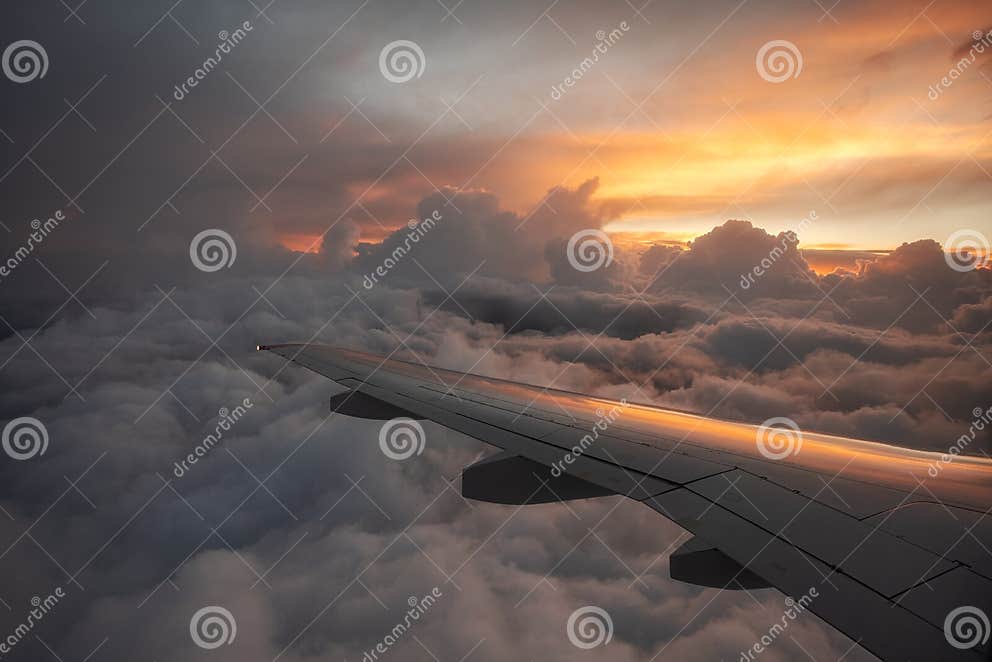 Evening Flight Over Storm Clouds. Flight during a Storm Stock Photo ...
