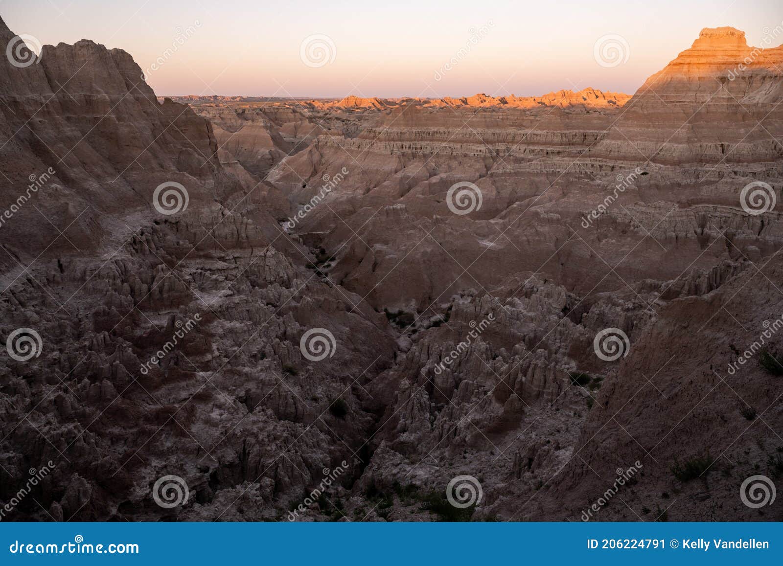 Evening Light Falls Over Badlands Valley Stock Image - Image of clouds ...