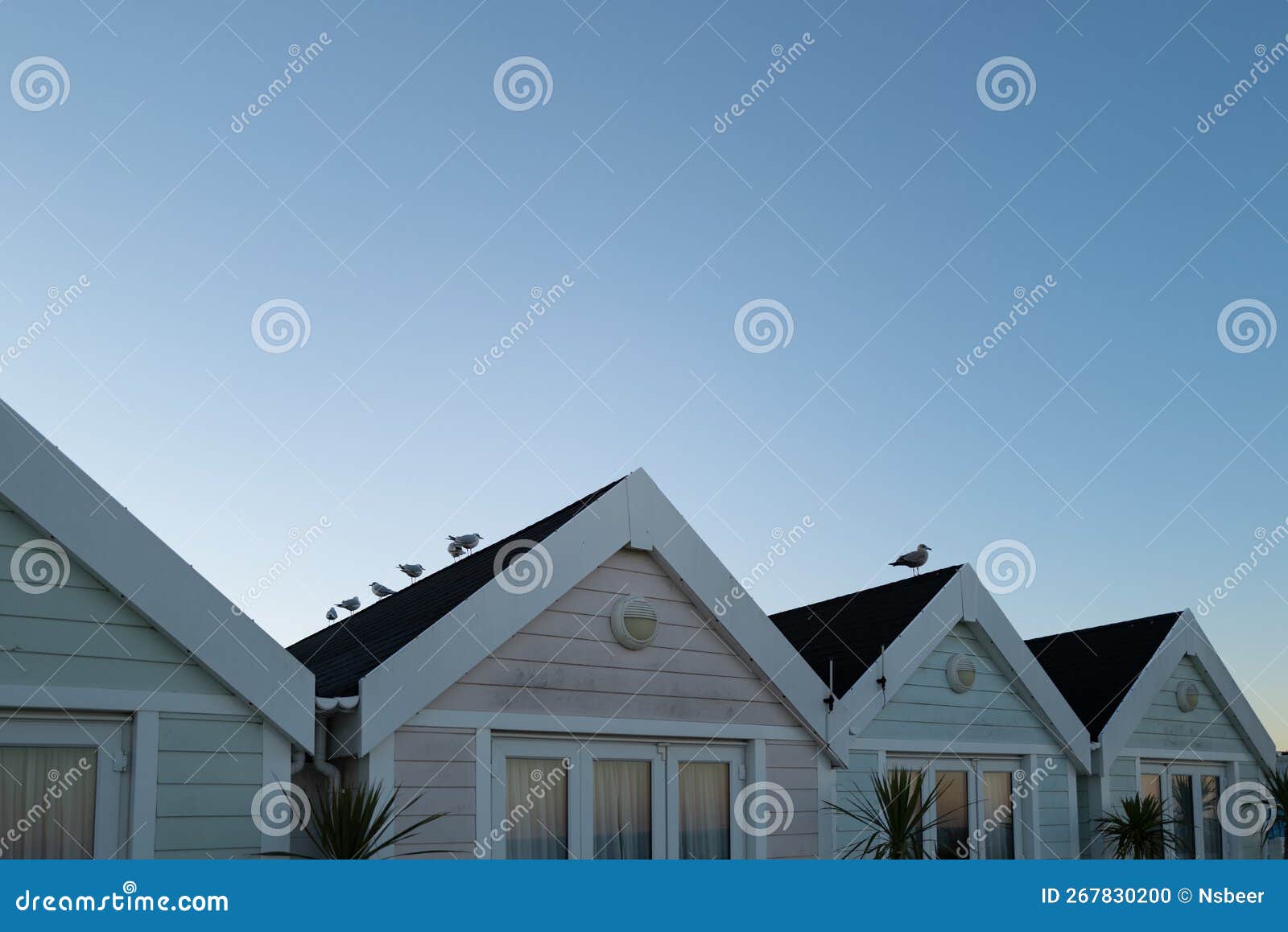 Evening, Low Light View of Luxury Beach Front Chalets. Stock Photo ...