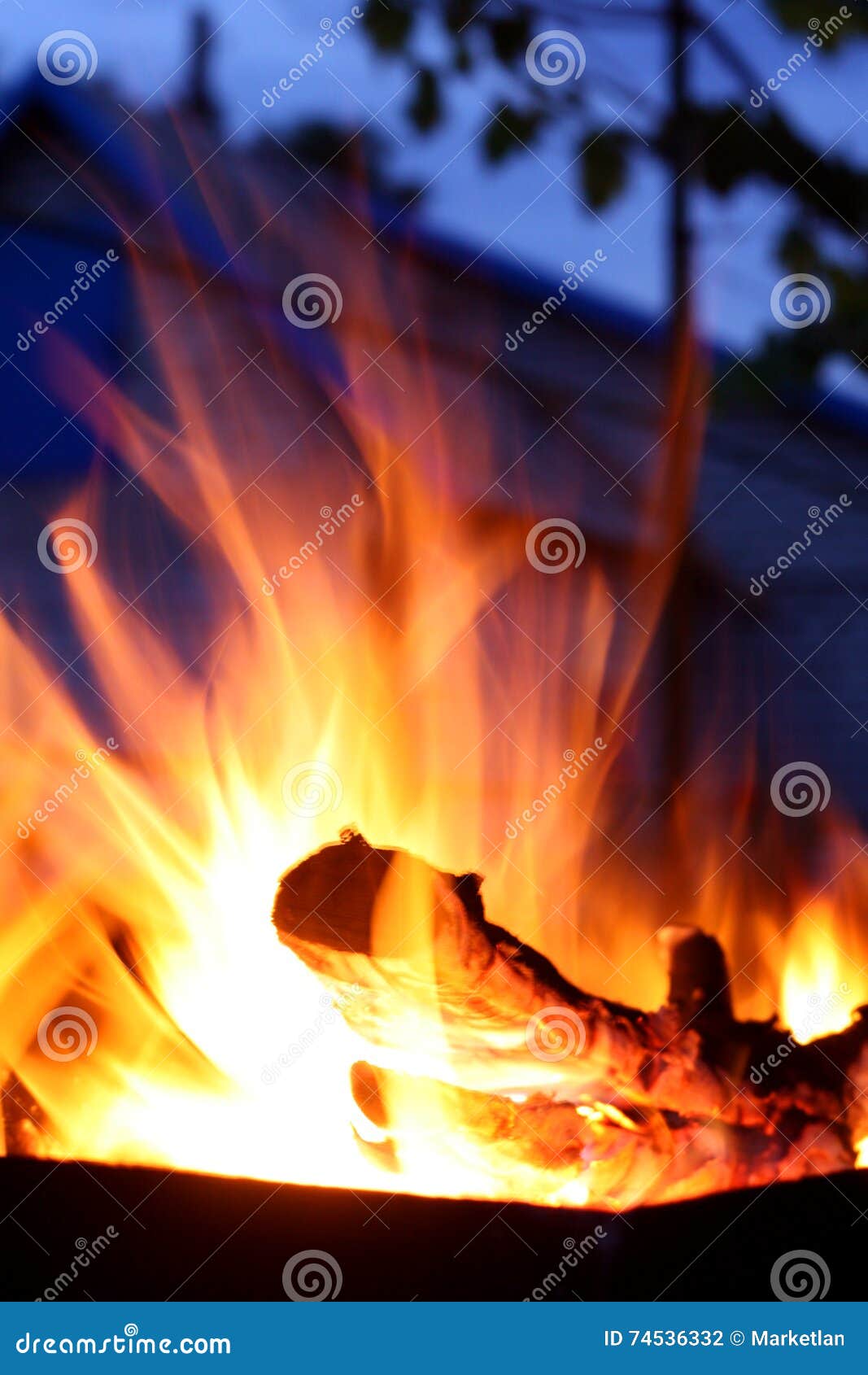Evening rest near a fire stock photo. Image of bonfire - 74536332