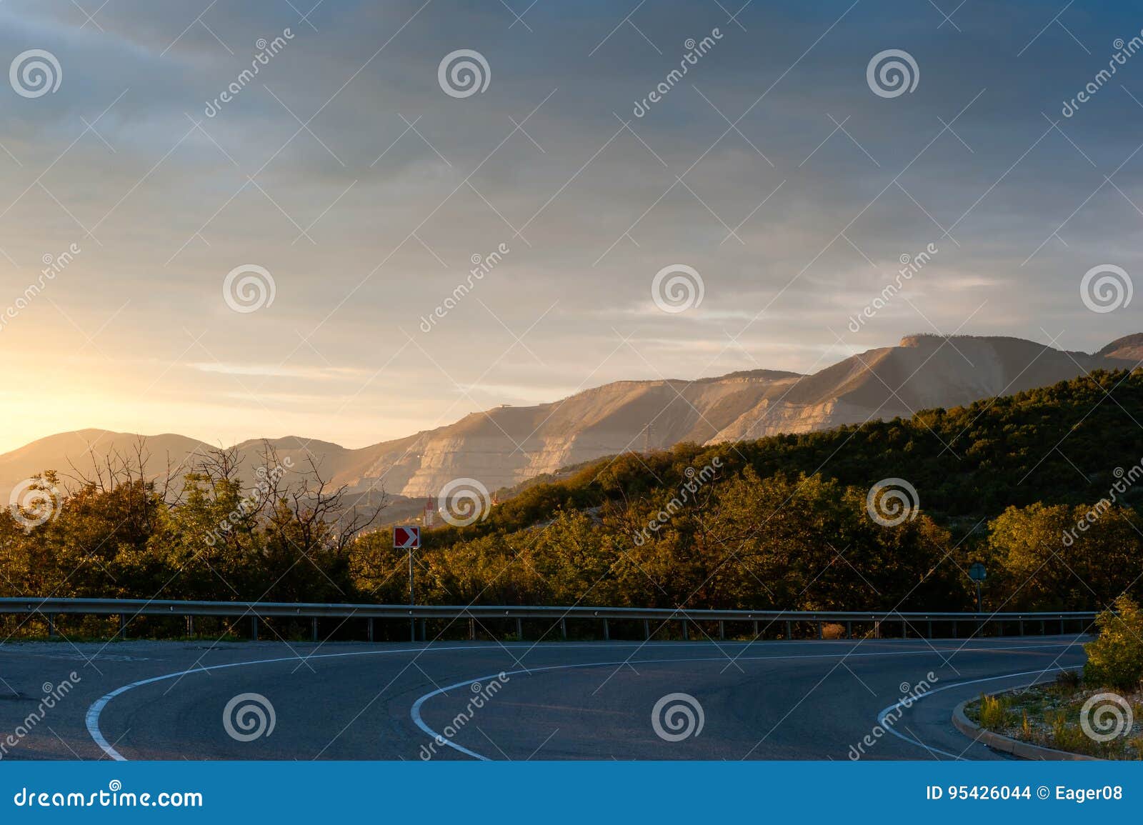 Evening road stock photo. Image of sunlight, mountains - 95426044