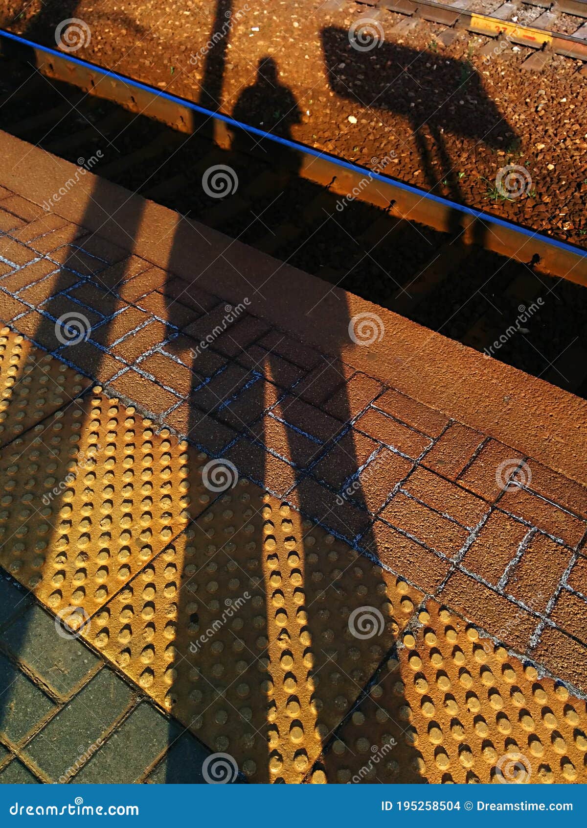 Evening Shadows on a Train Station Stock Photo - Image of awaiting ...