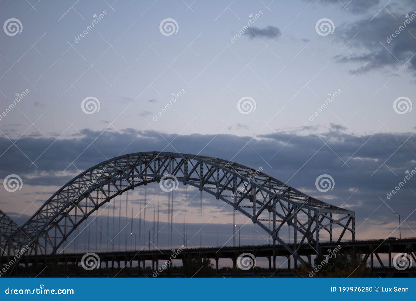 Evening Silhouette of Riverfront Bridge Stock Photo - Image of city ...