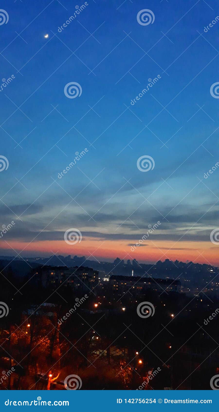 Evening sky stock photo. Image of lights, buildings - 142756254