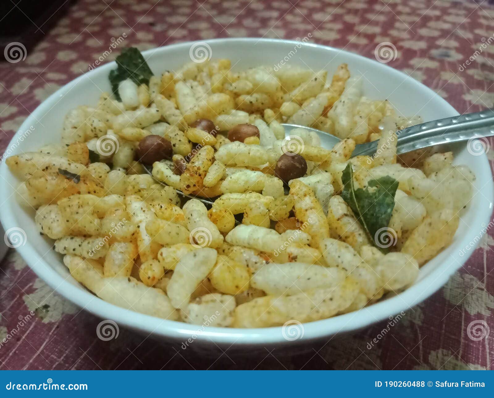 Evening Snacks Masala Poha Garnished with Peanuts and Curry Leaves ...