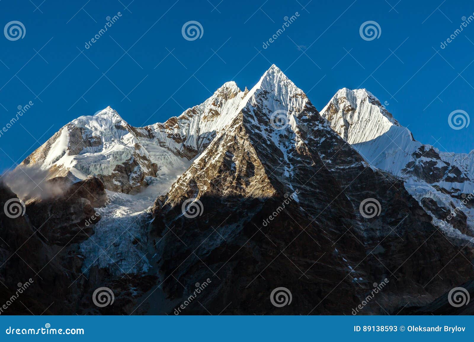 Evening View of Group of Pyramidal Shape Mountain Peaks Stock Image ...