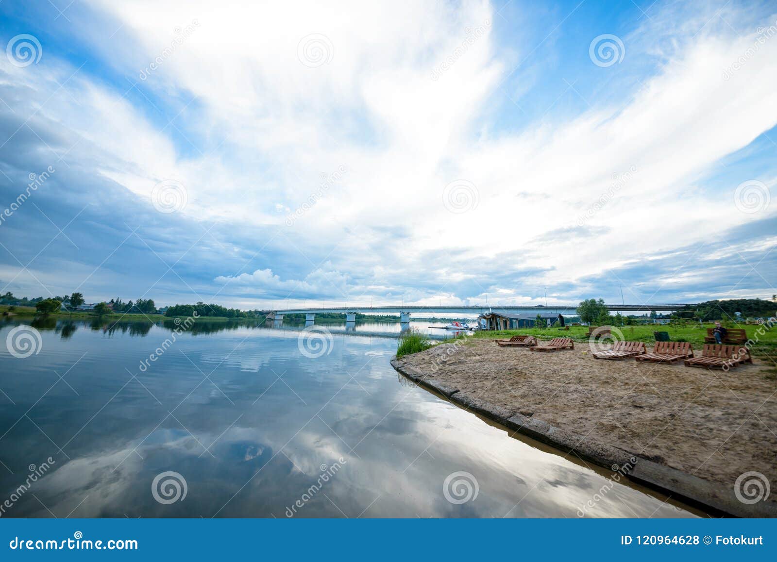 View of the River from the Shore with a Beautiful Sky and Clouds Stock ...
