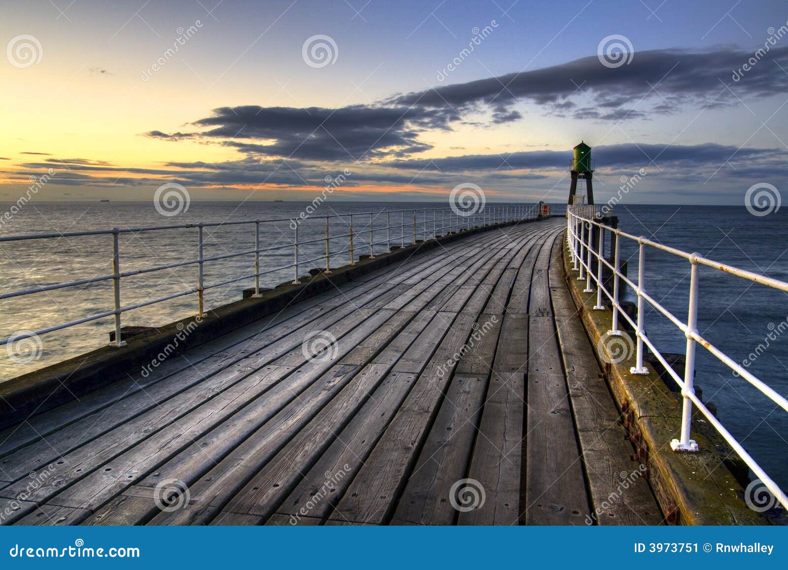 Evening on Whitby Pier stock image. Image of peaceful - 3973751
