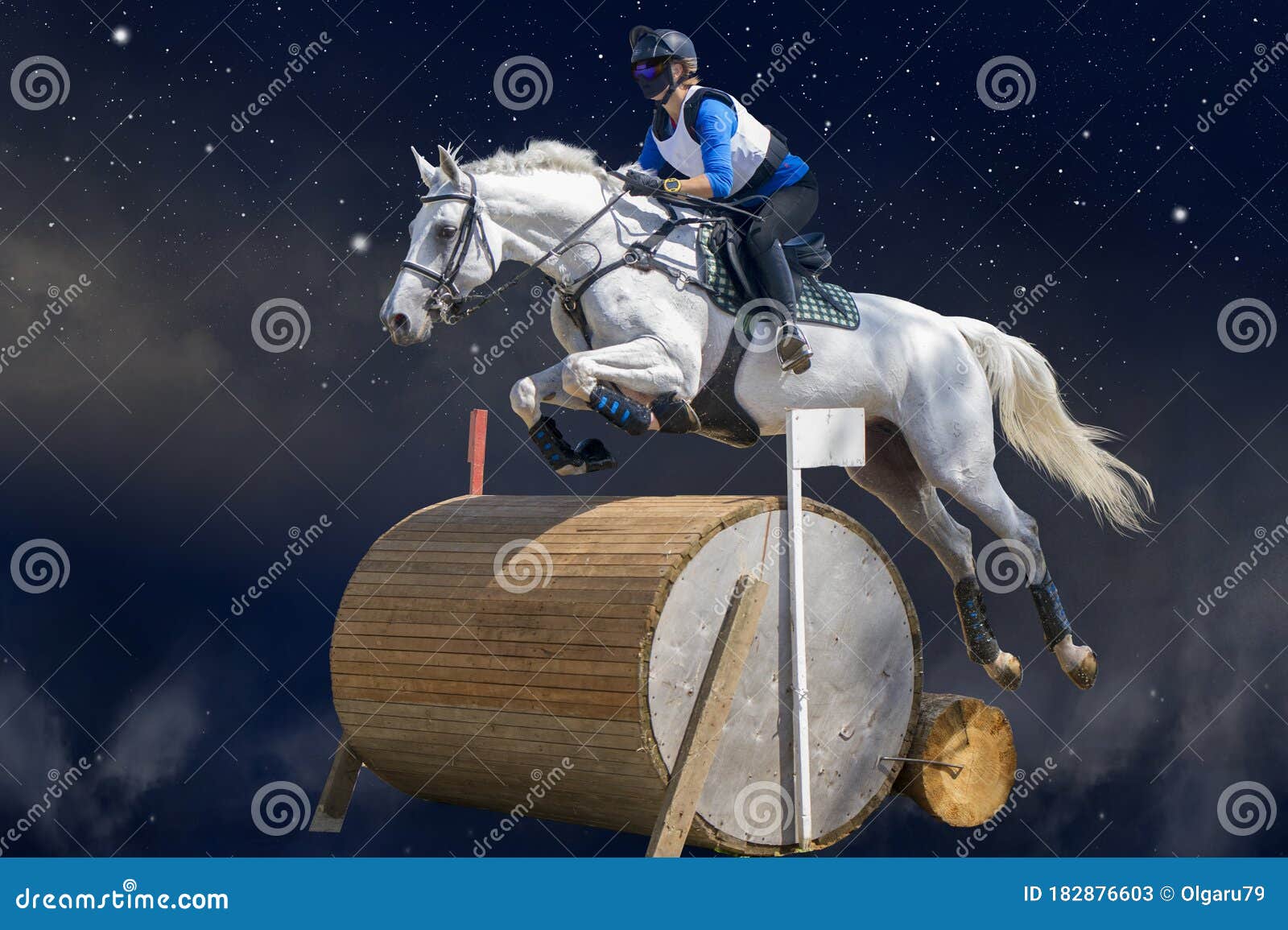 Eventing: Equestrian Rider Jumping Over An A Log Fence Water Obstacle ...