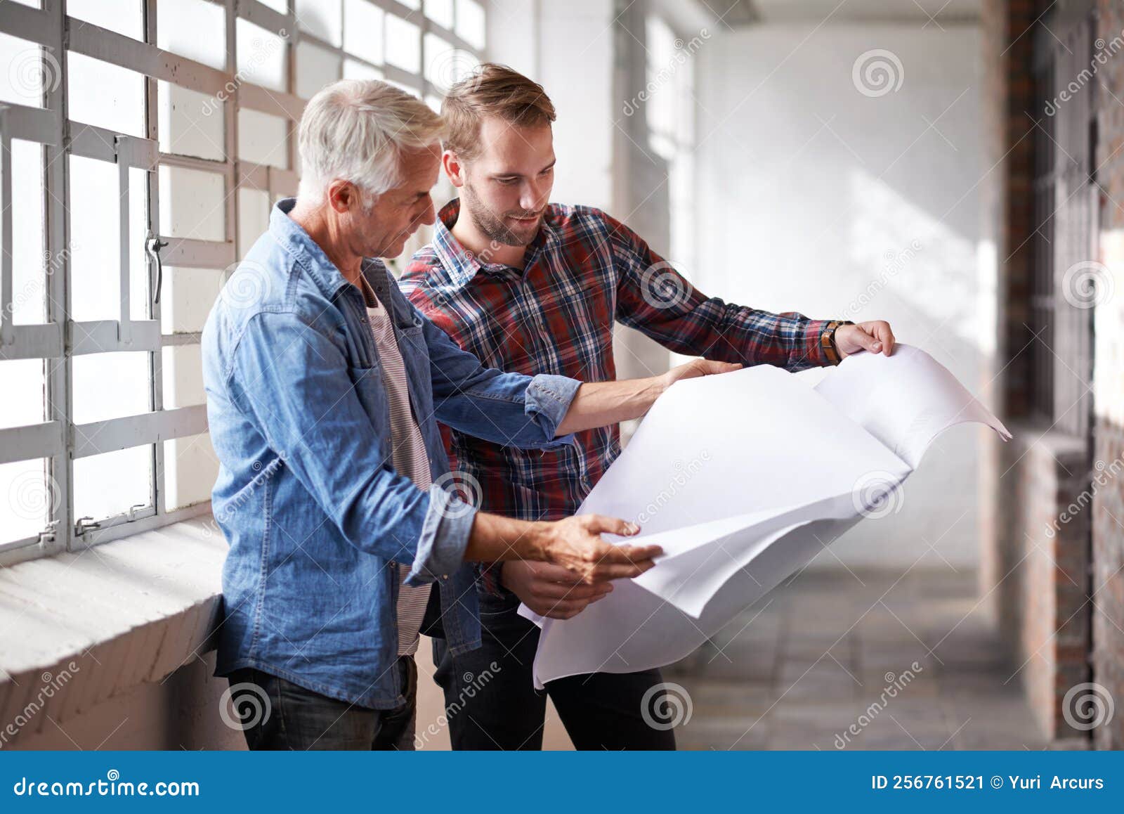 Every Beginner Architect Needs a Helping Hand. Two Male Architects ...