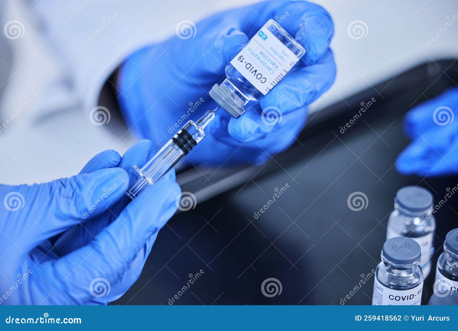 Every Dose is Life-saving. an Unrecognizable Scientist Using a Syringe ...