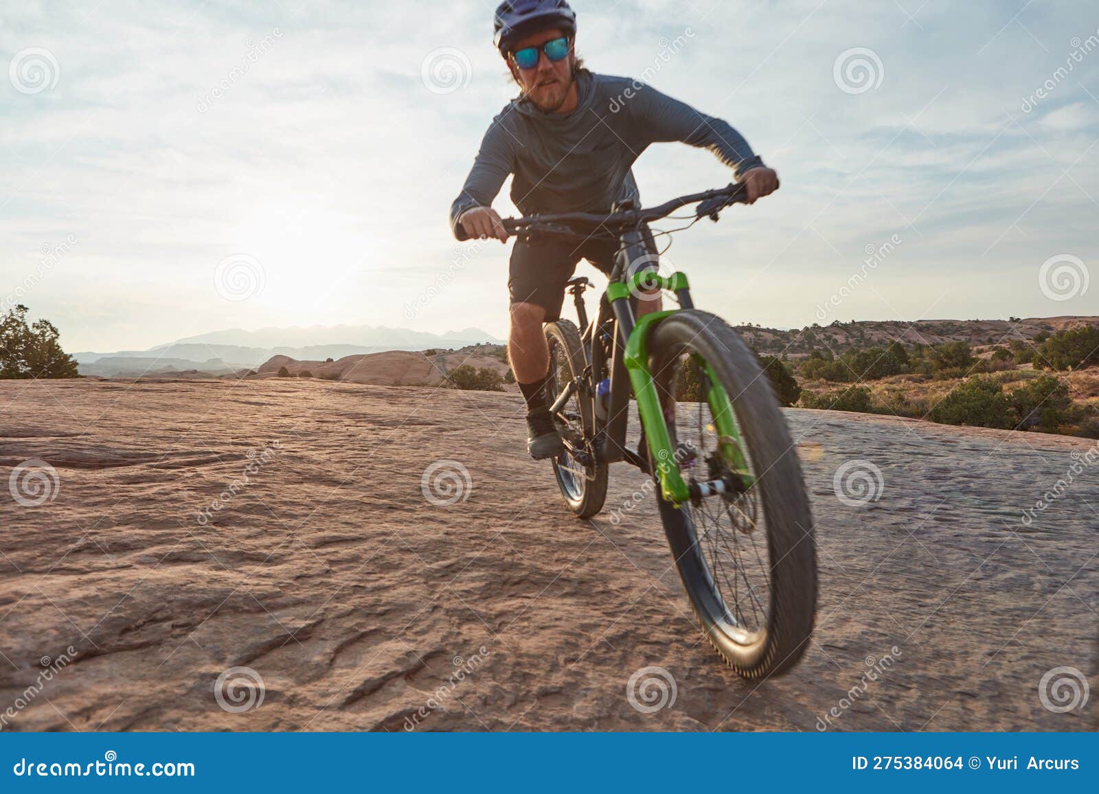 Every Ride is Different. a Young Man Out Mountain Biking during the Day ...