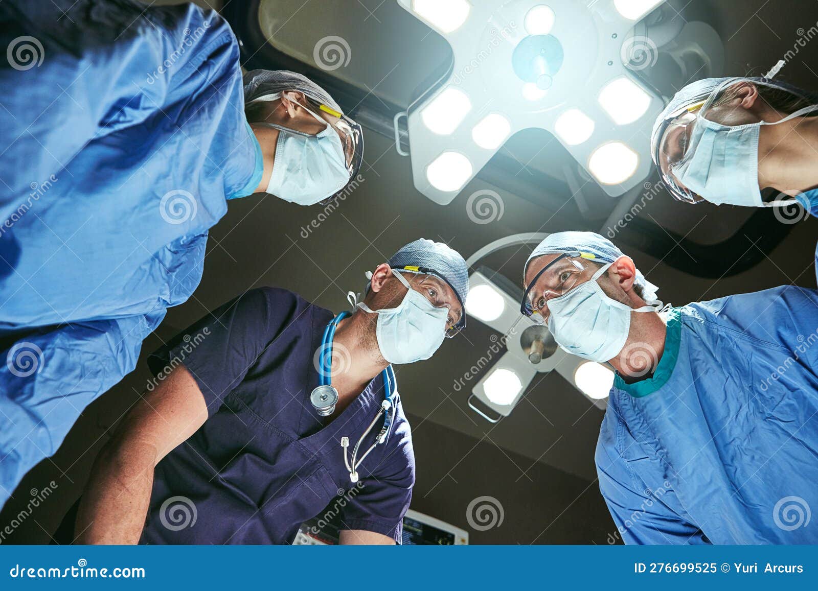 Every Second Counts. Low Angle Shot of Surgeons in an Operating Room ...