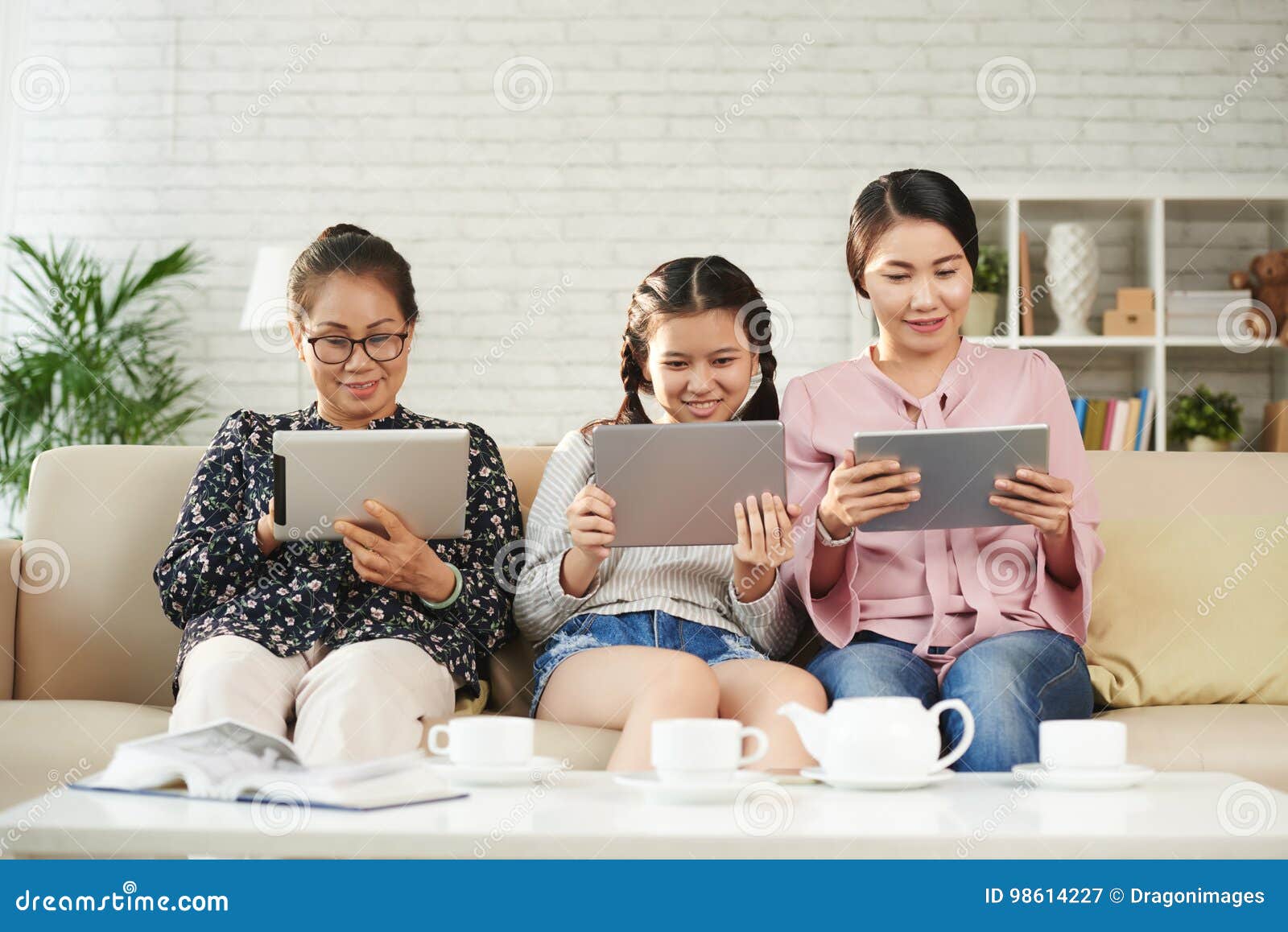 Everybody with tablets stock image. Image of teenager - 98614227