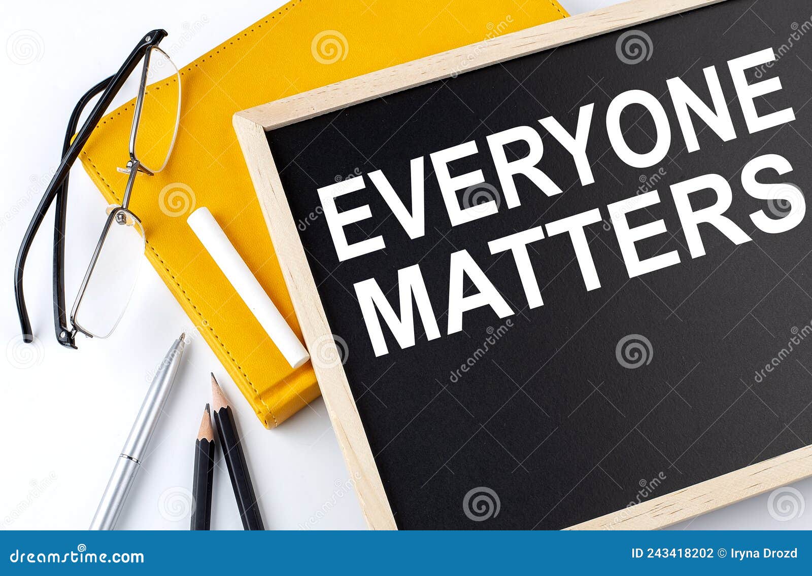 EVERYONE MATTERS Text on Blackboard with Notepad, Pencil Stock Photo ...