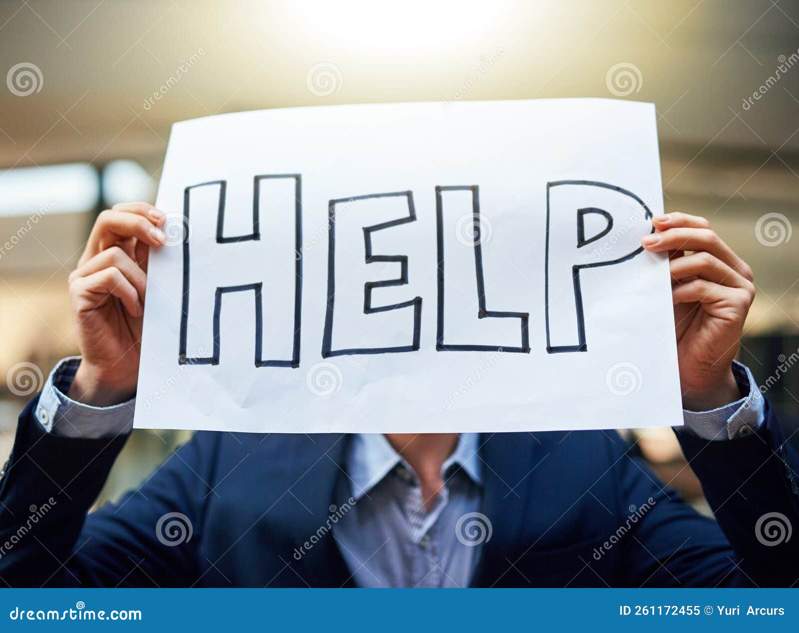 Everyone Needs a Bit of Help Sometimes. a Businessman Holding Up a Sign ...