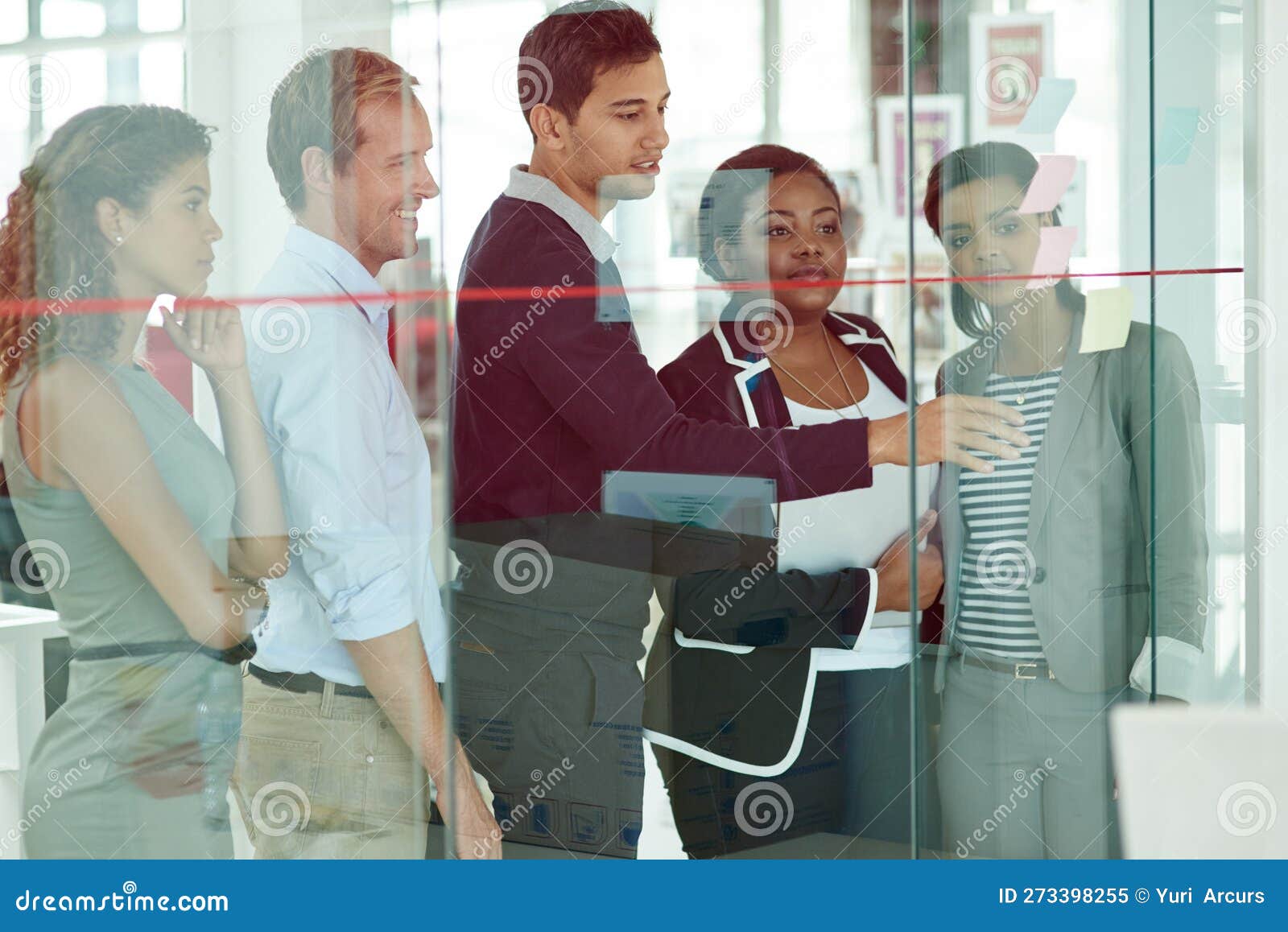 Everyone is on the Same Page. a Group of Colleagues Brainstorming in an ...