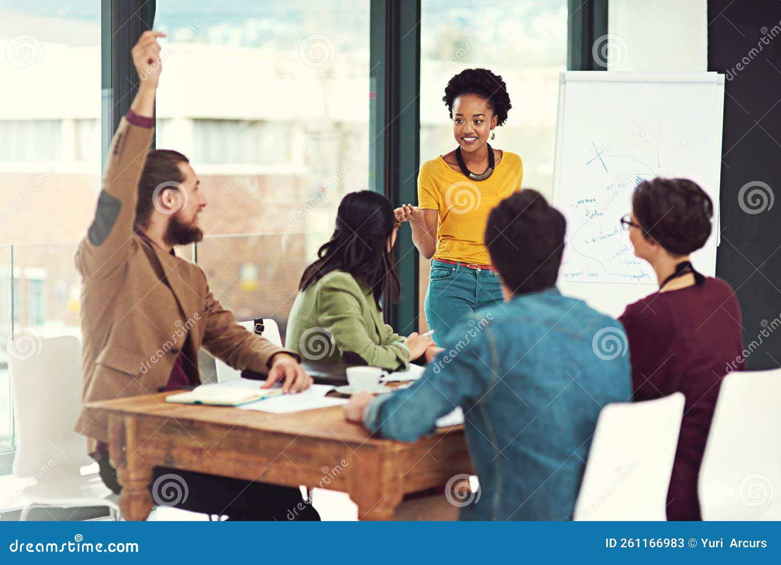 Everyones Input is Important. a Young Creative Giving a Presentation To ...