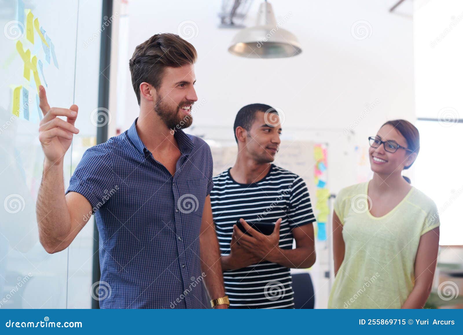 Everything Begins with an Idea. a Group of Colleagues Discussing Ideas ...