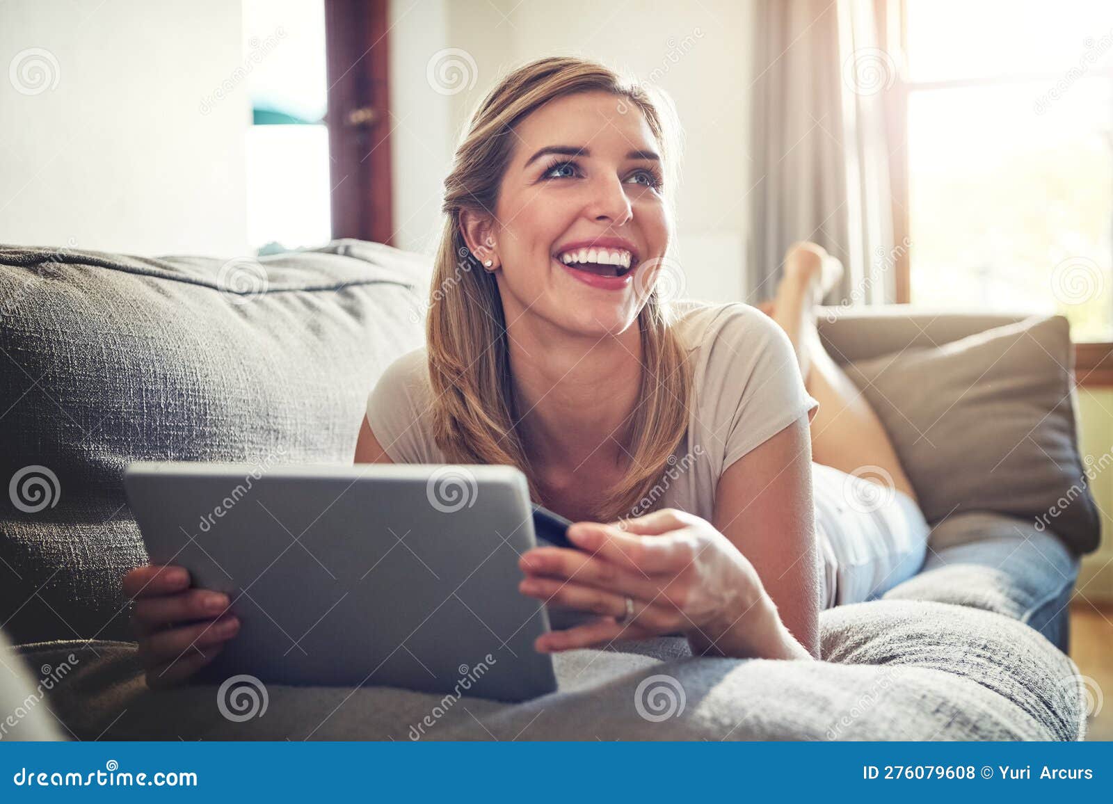 Everything is Just One Click Way from You. a Young Woman Looking ...