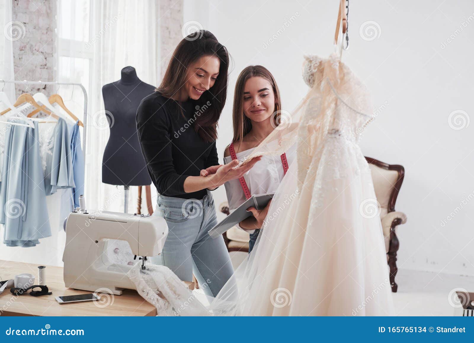 Everything Looks Well. the Process of Fitting the Dress in the Studio ...