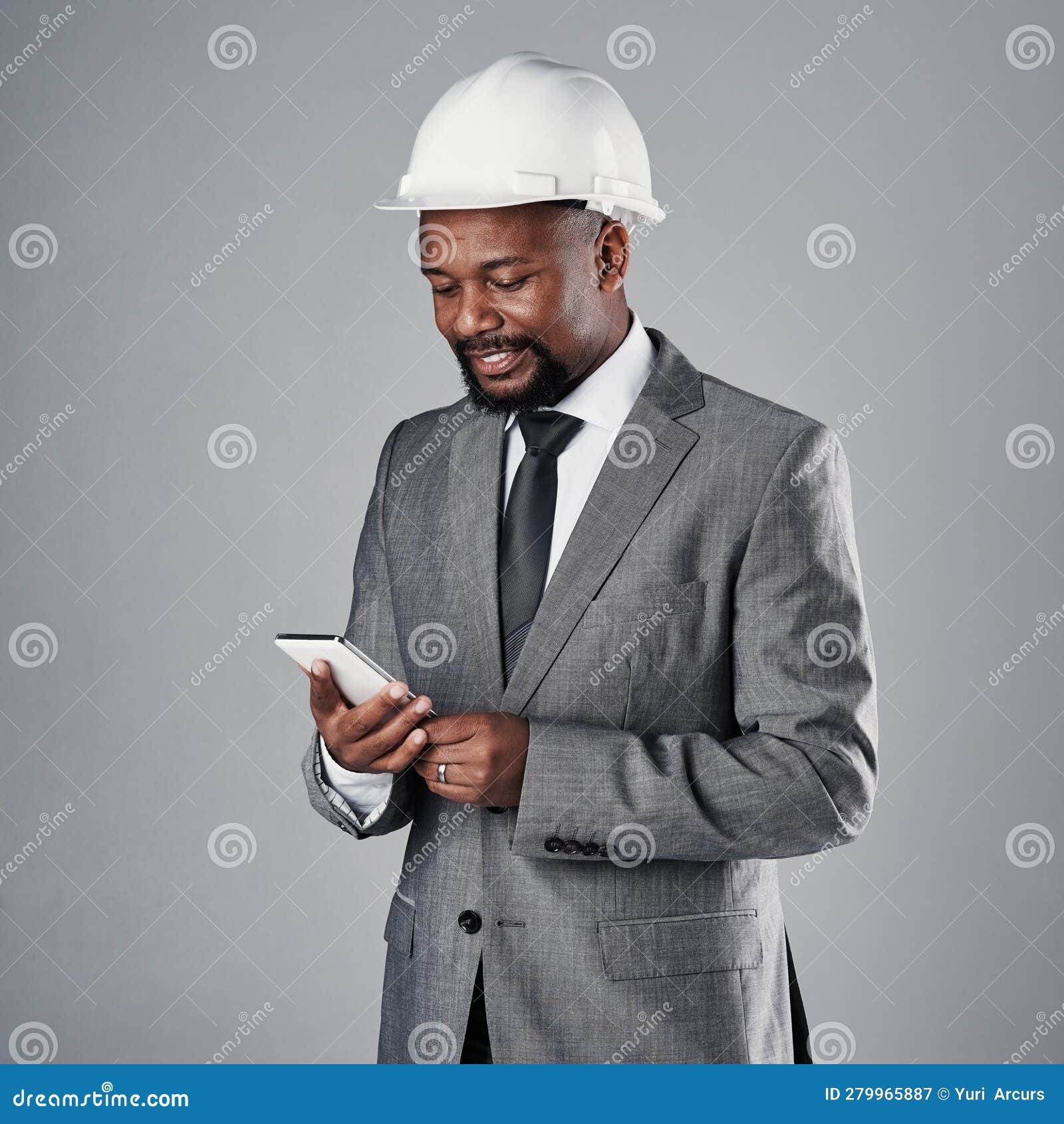 Everything is Right on Schedule. a Well-dressed Civil Engineer Using ...