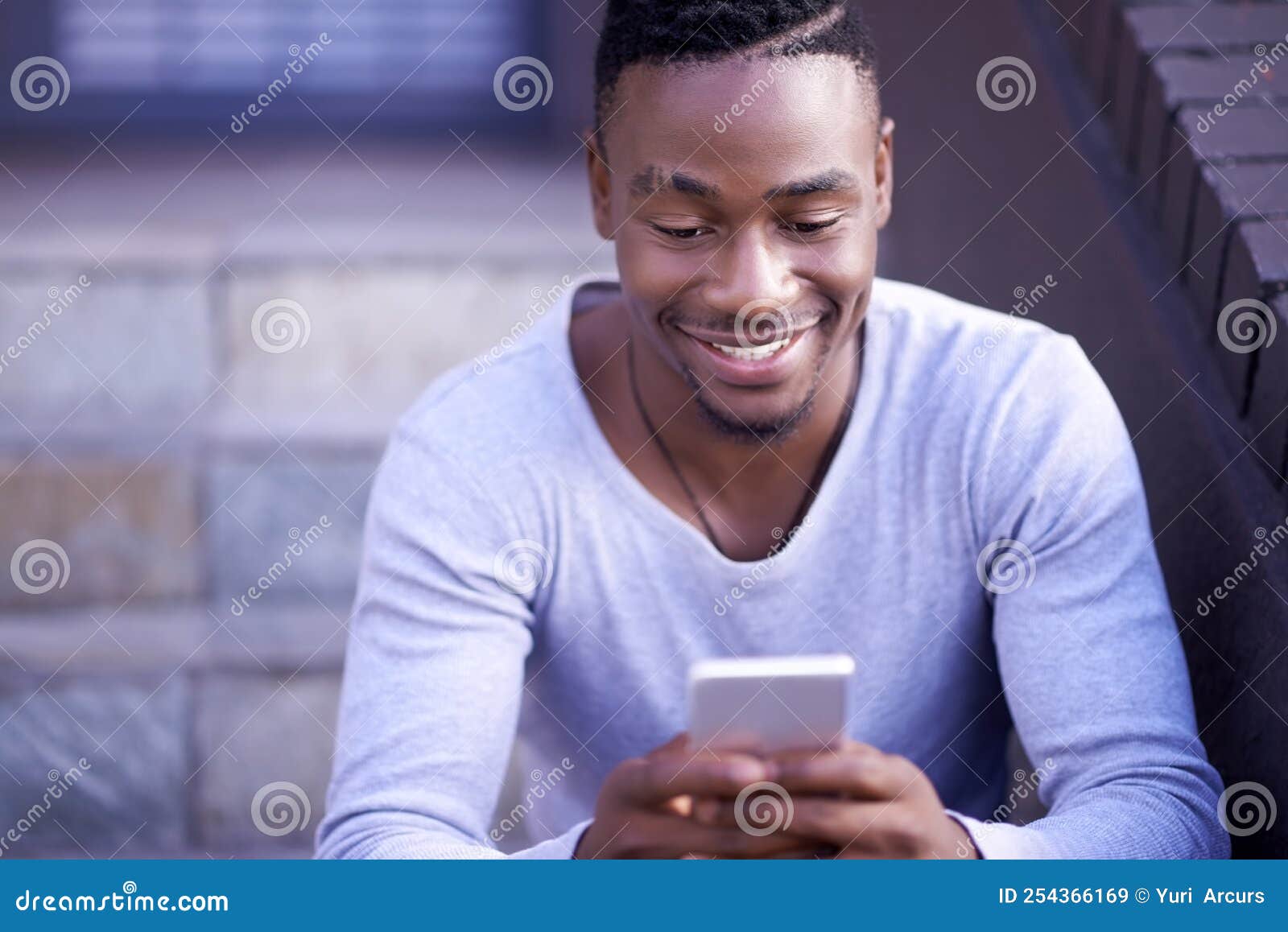 Everything You Need in One Click. a Young Man Using Wireless Technology ...