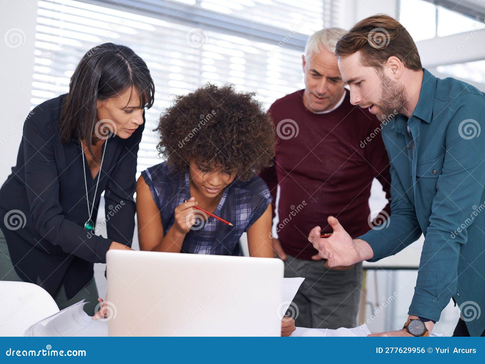 Everythings Going According To Plan. a Group of Architects Using a ...