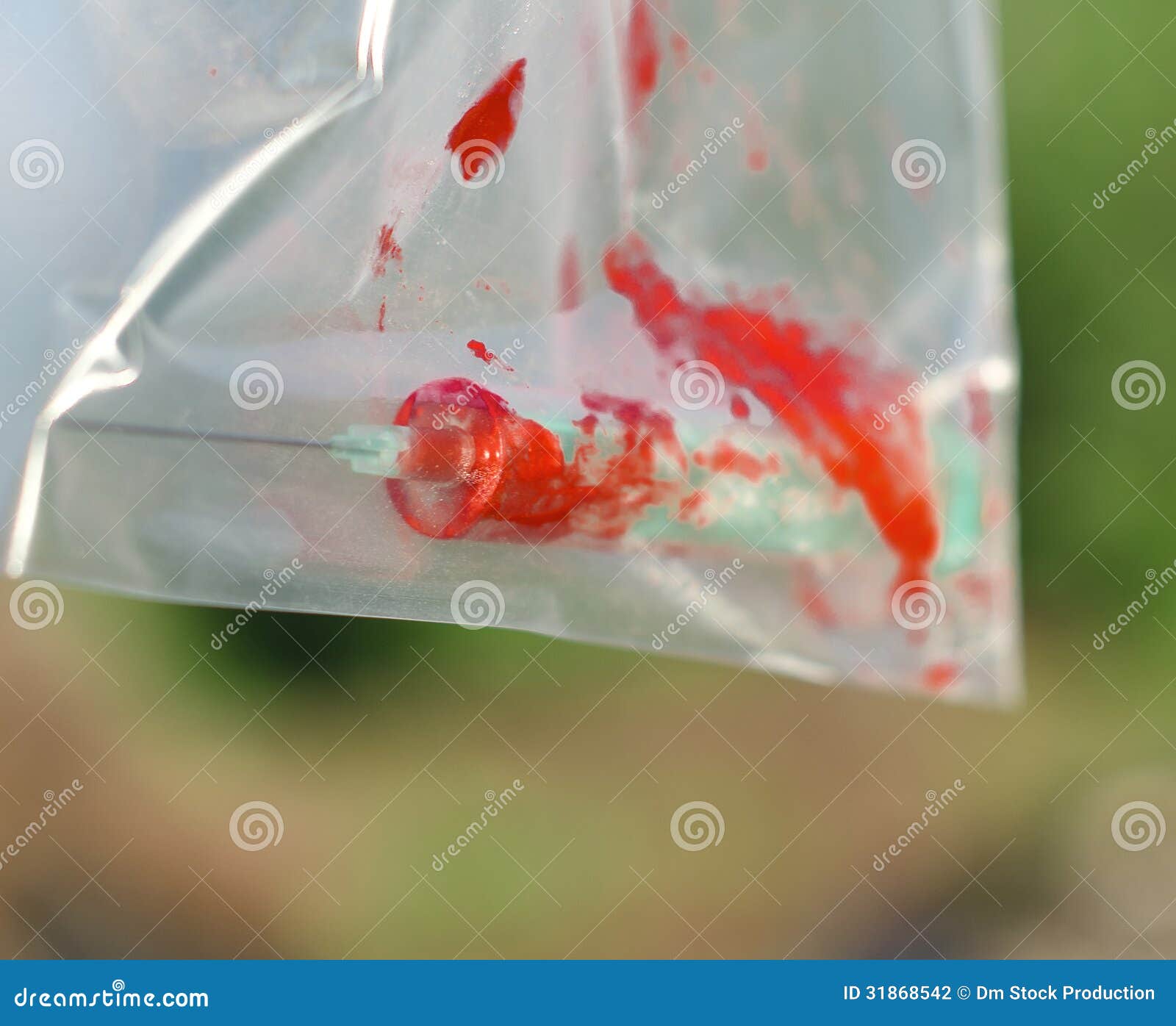 Evidence. Syringe in blood stock photo. Image of scene - 31868542