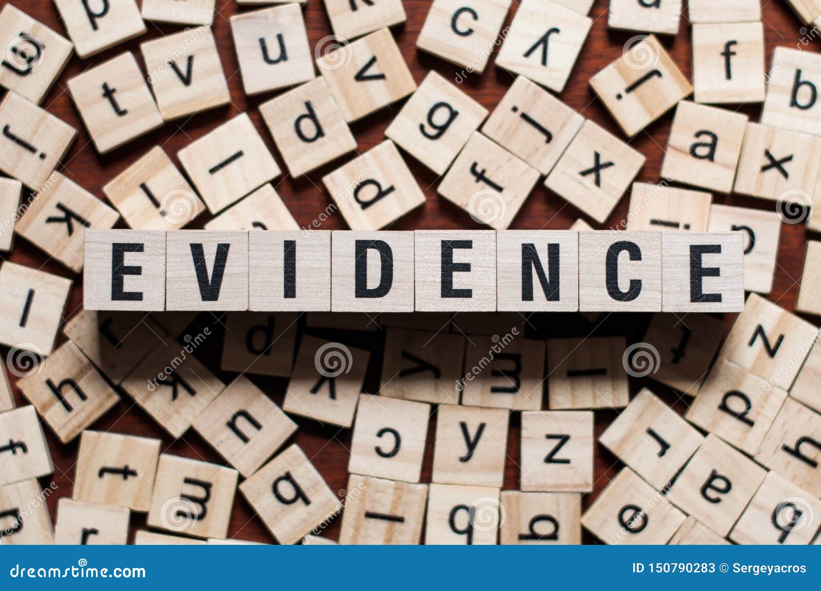 EVIDENCE - Word Written On Wooden Blocks On Light Blue Background ...
