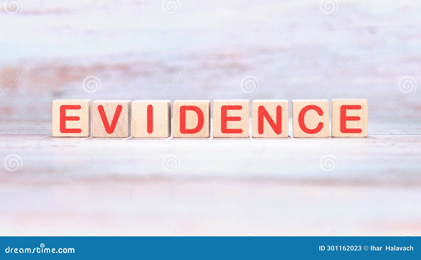 EVIDENCE - Word Written On Wooden Blocks On Light Blue Background ...