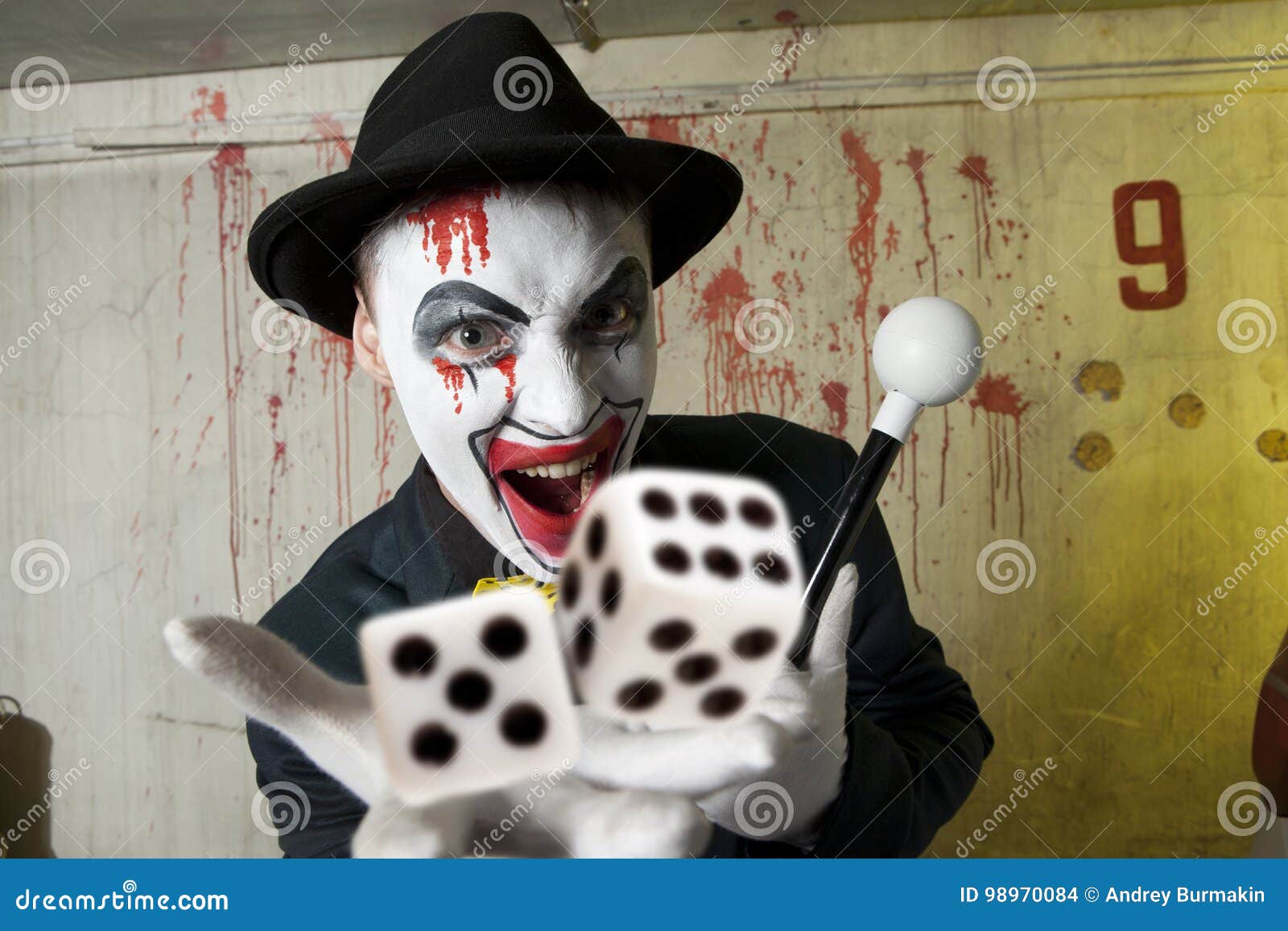 Evil Clown Playing with Dice Stock Photo - Image of frightening, fright ...