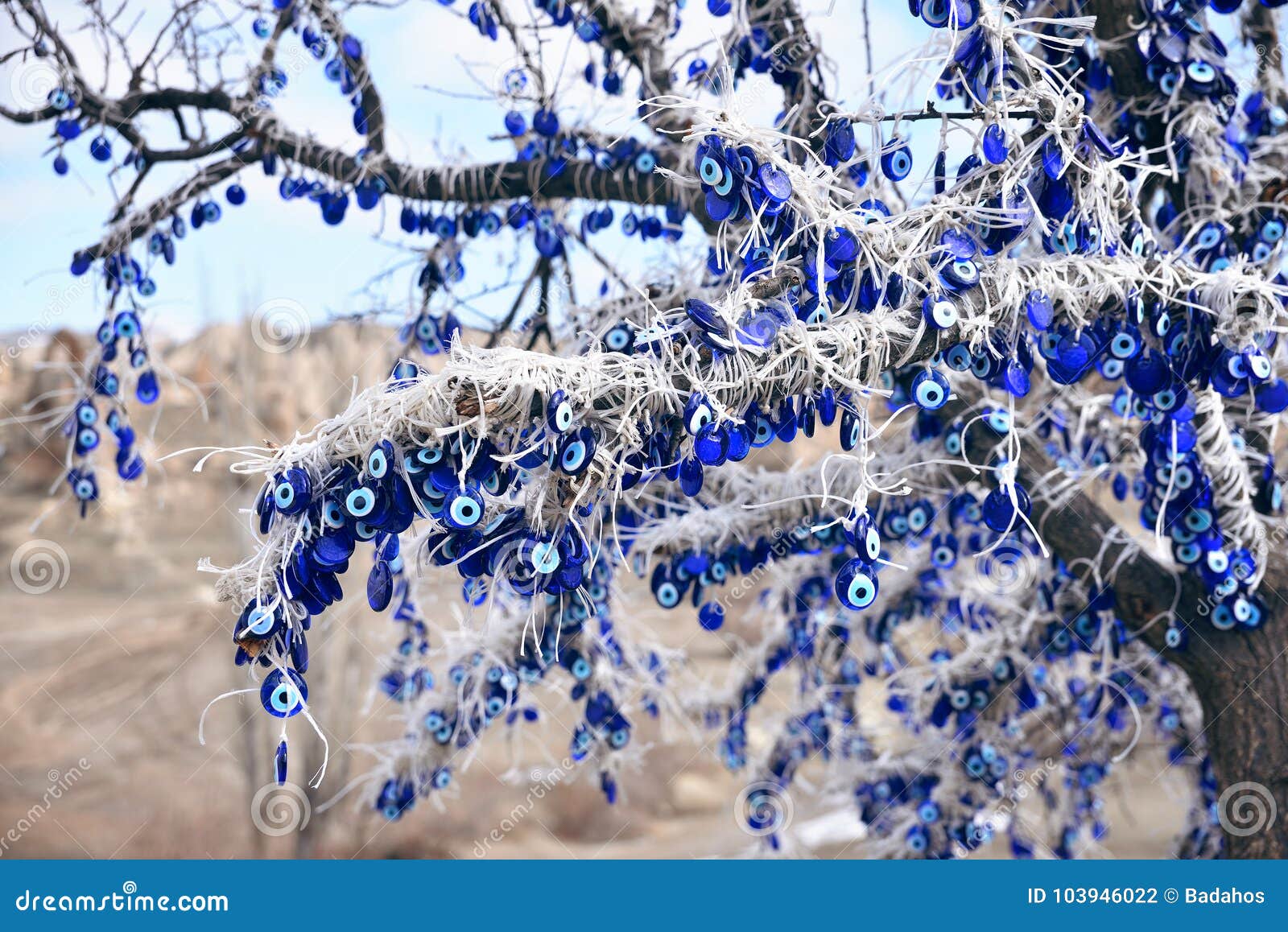 Evil eye on tree stock photo. Image of culture, good - 103946022