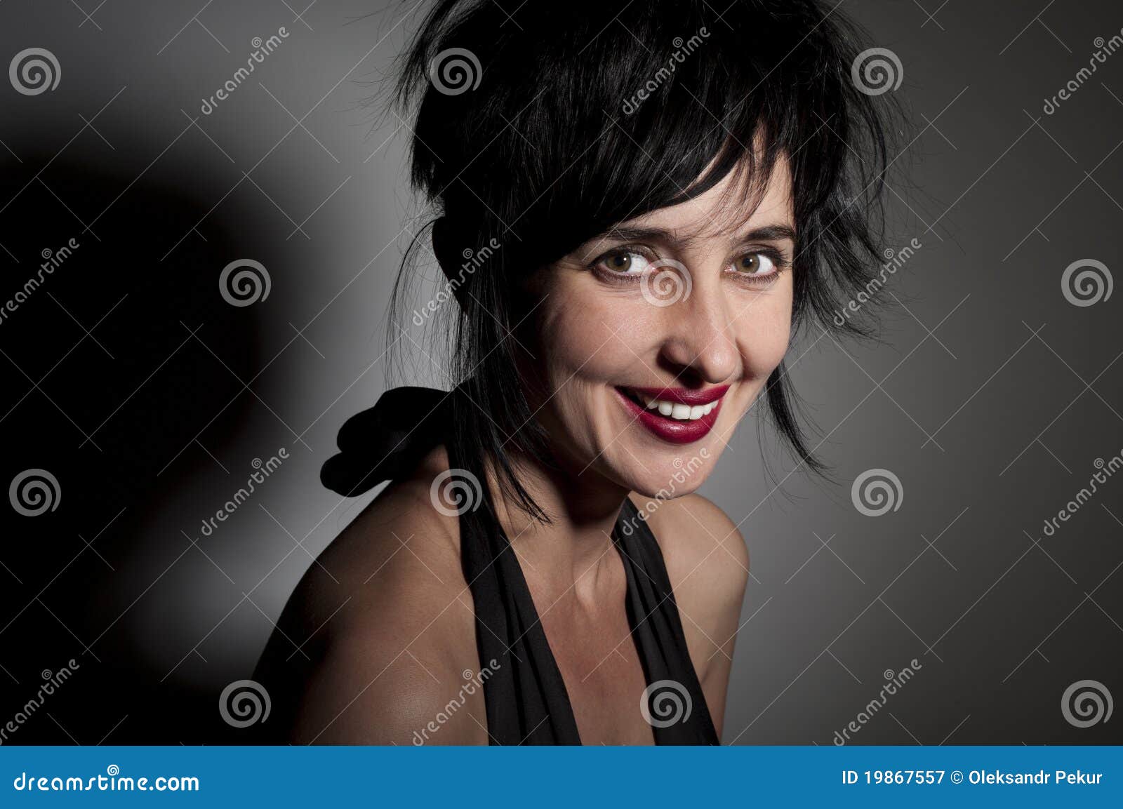 Evil Looking Laughing Woman Stock Image - Image of spot, shadow: 19867557