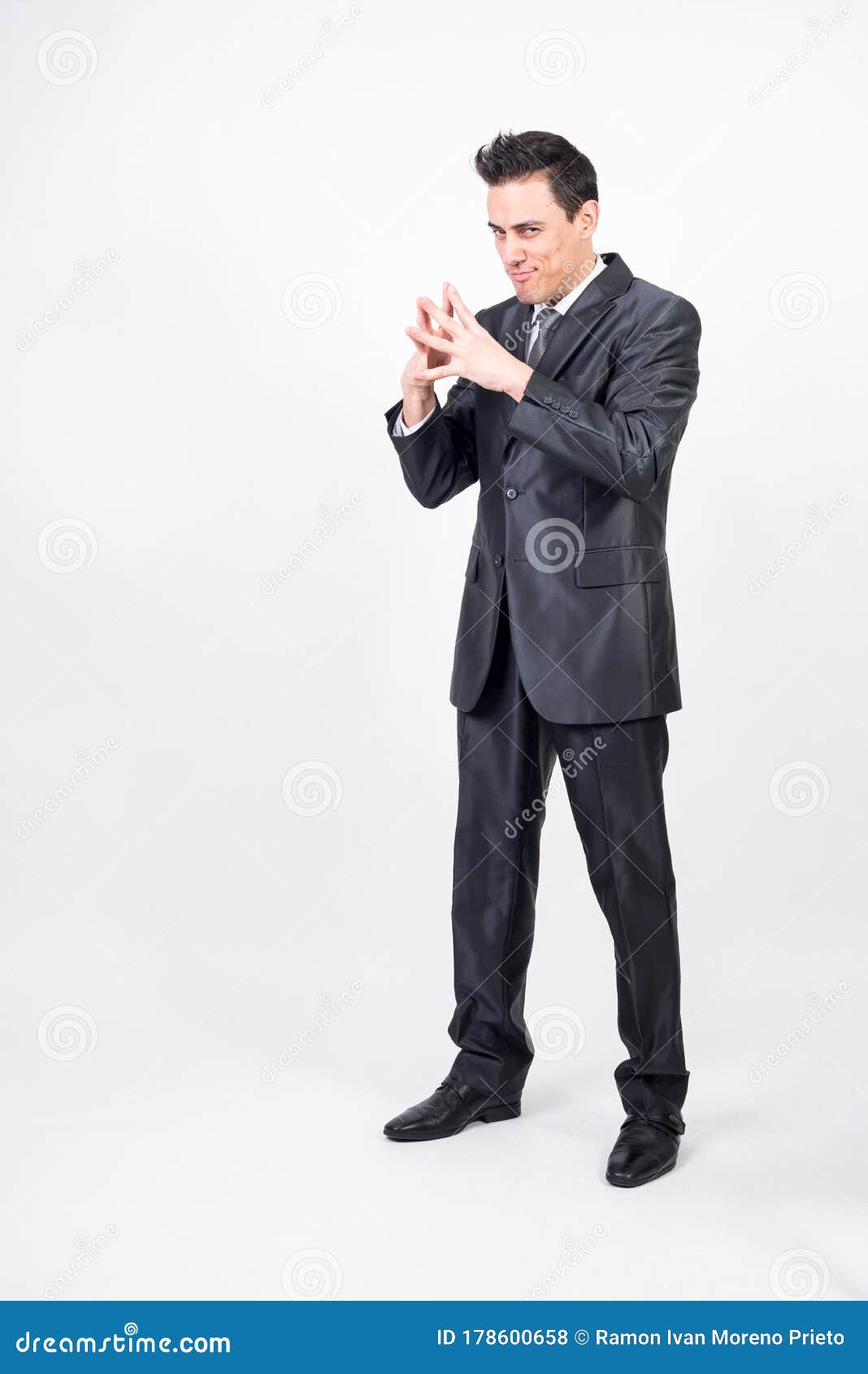 Evil man in suit stock photo. Image of plotting, suit - 178600658