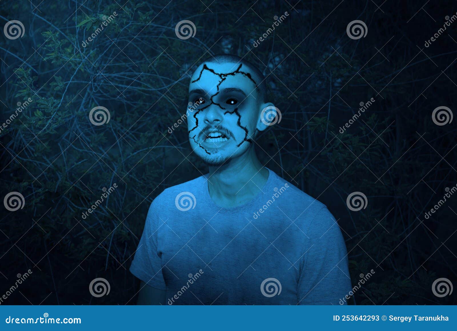 An Evil Monster with Sharp Fangs Black Eyes and Scars in the Wilderness ...