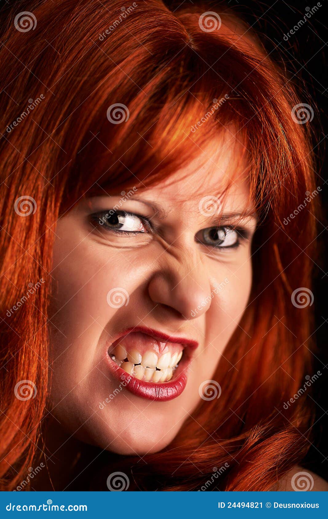 Evil red-head woman stock image. Image of mouth, young - 24494821