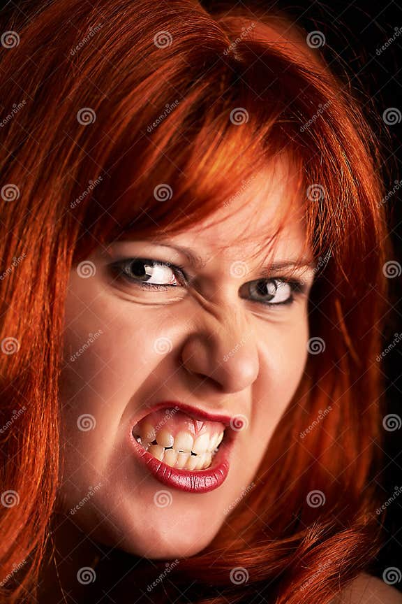 Evil red-head woman stock image. Image of mouth, young - 24494821