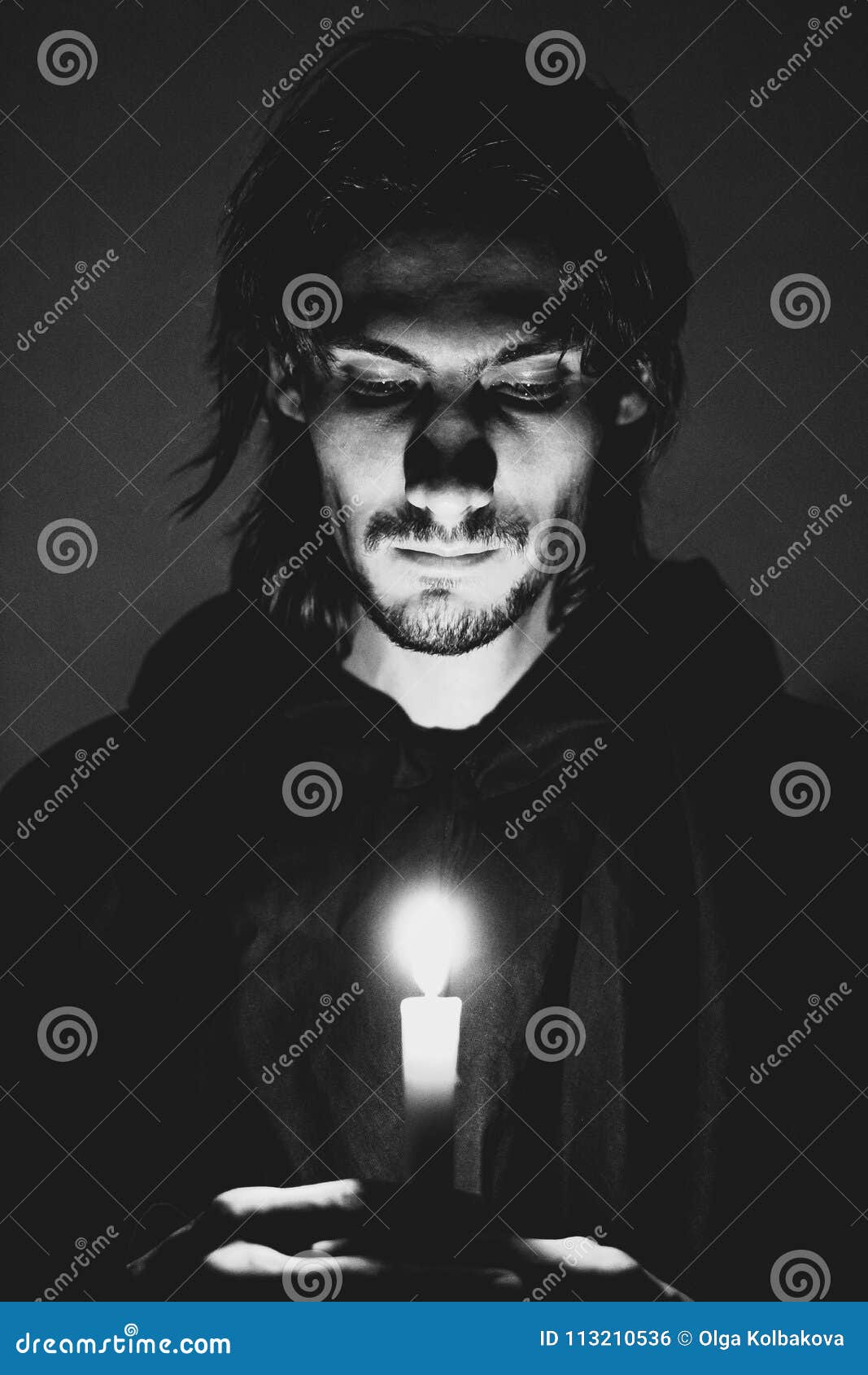Evil Sorcerer with a Candle Stock Photo - Image of demons, carnival ...