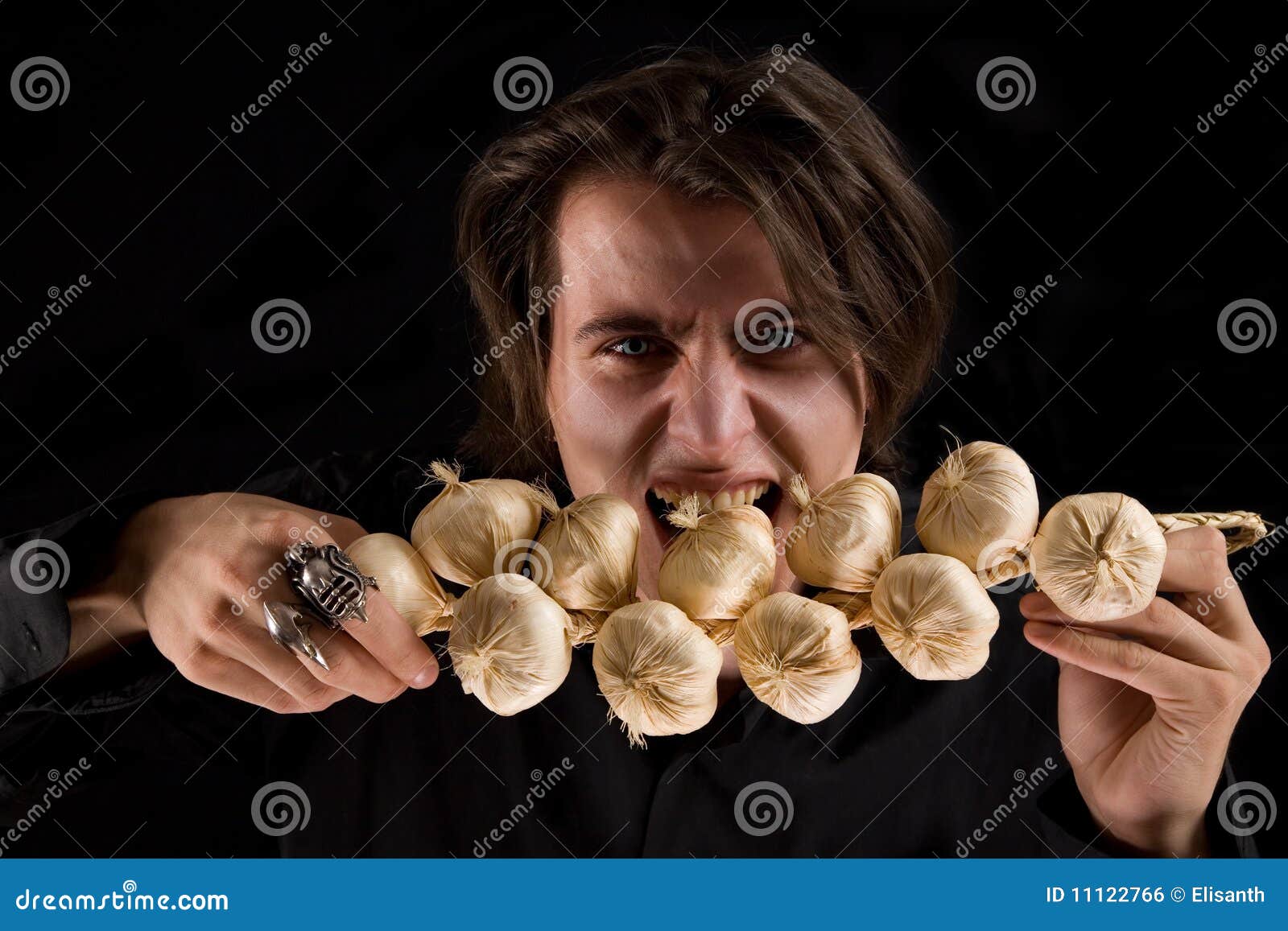 Evil Vampire With Scary Eyes Eating Garlic Royalty Free Stock Image ...