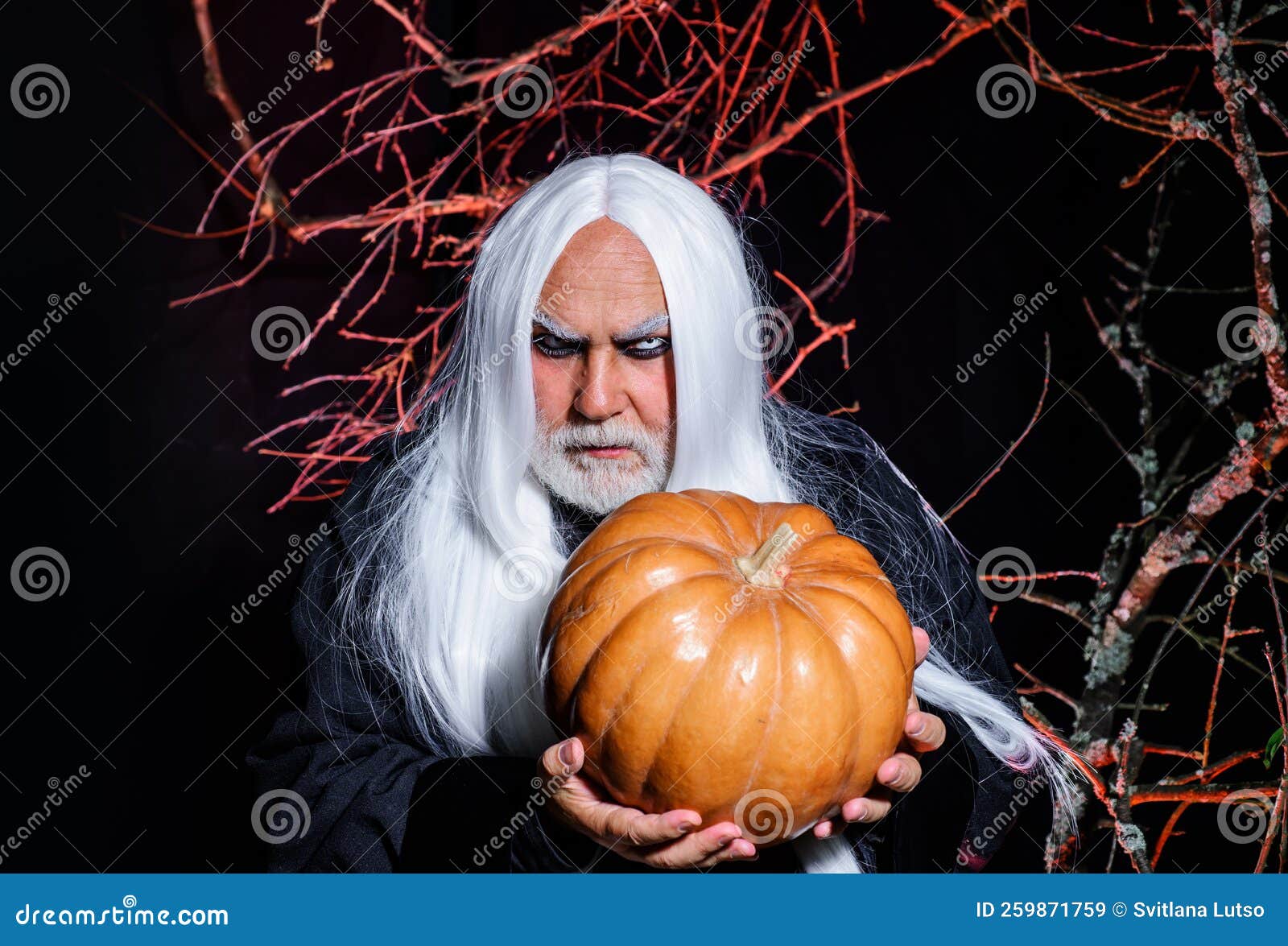 Evil Wizard with Halloween Pumpkin. Devil Vampire Man. Handsome Demon ...