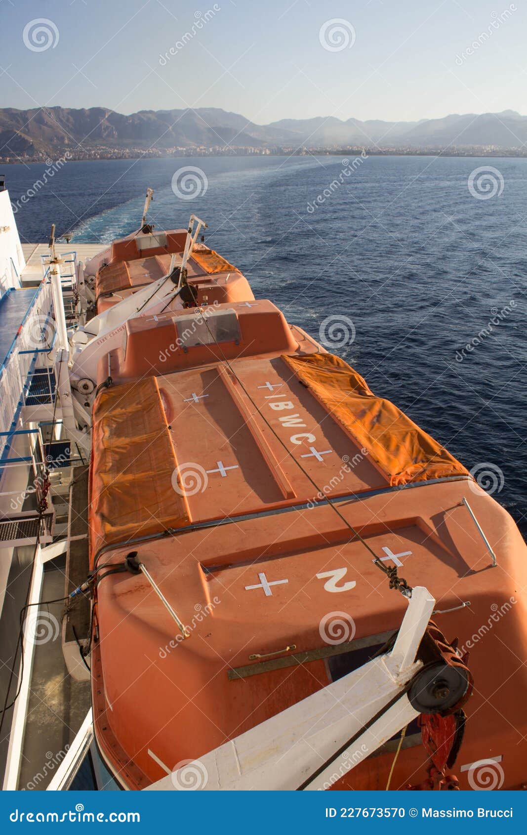 Lifeboat On A Ferry. Lifeboat On Deck Of A Cruise Ship. View Of Boats ...