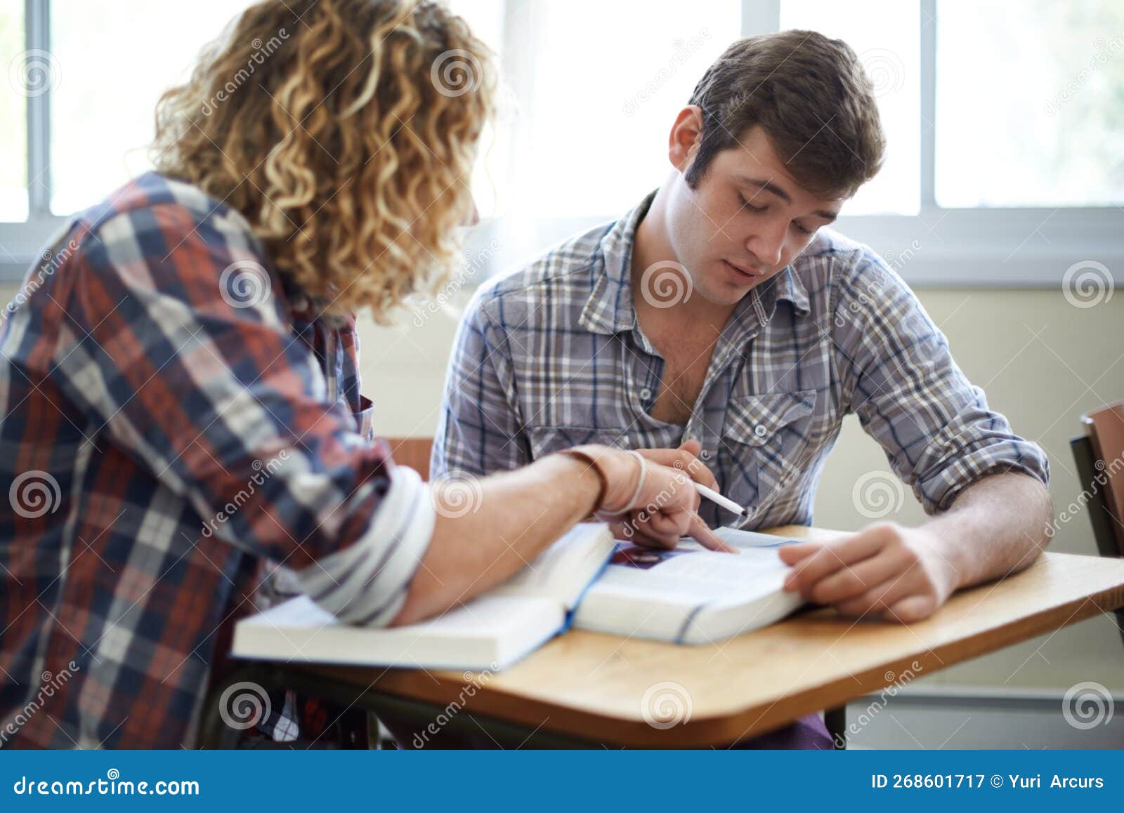 Exam Partners. Two Male Students Studying Together in Class. Stock ...