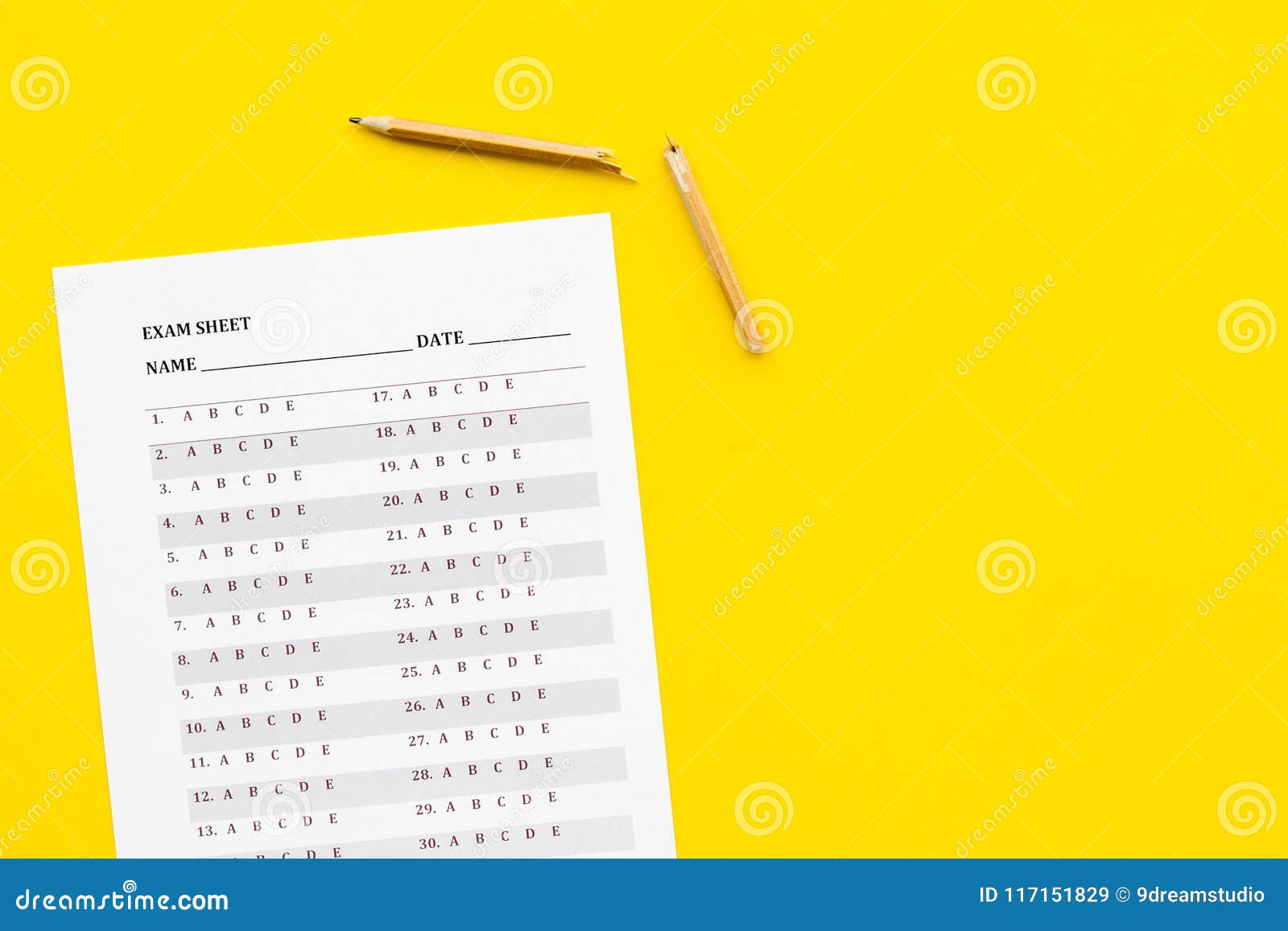Exam Sheet on Yellow Table Flat Lay Space for Text. Education Concept ...