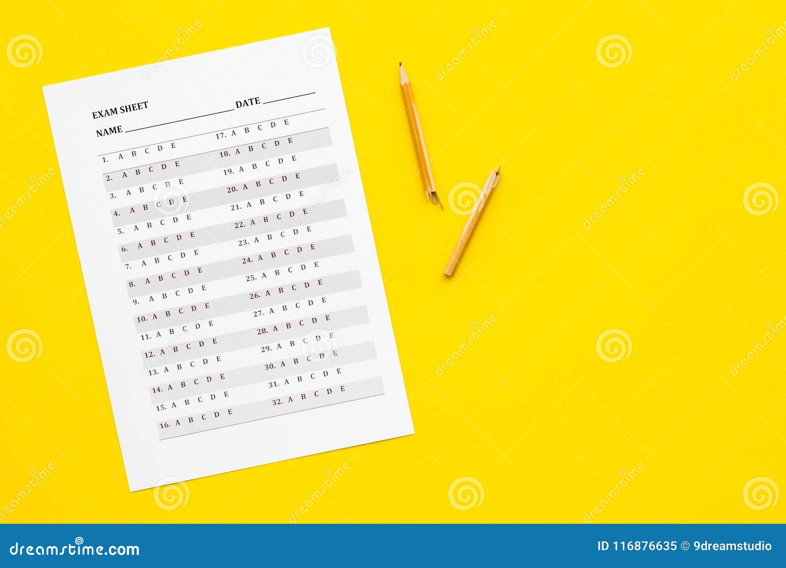 Exam Sheet on Yellow Table Flat Lay Space for Text. Education Concept ...
