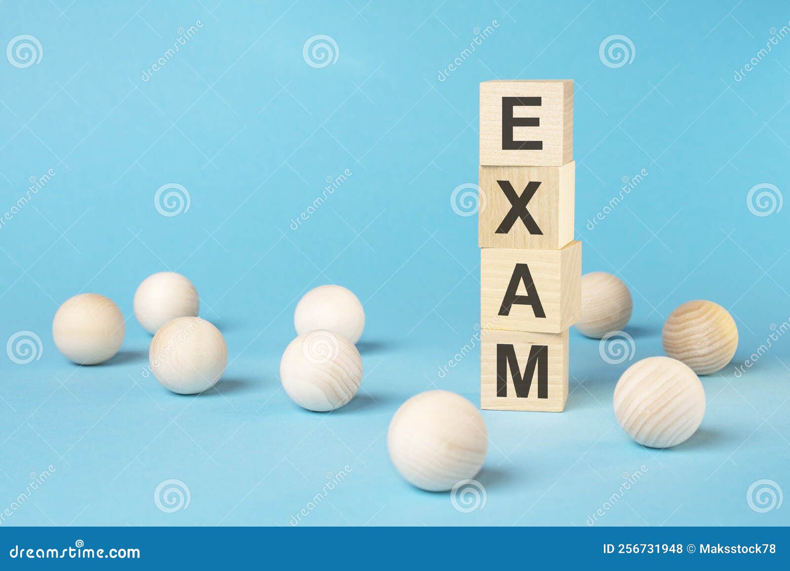 EXAM - Text on Wooden Block with Bright Blue Background Stock Photo ...