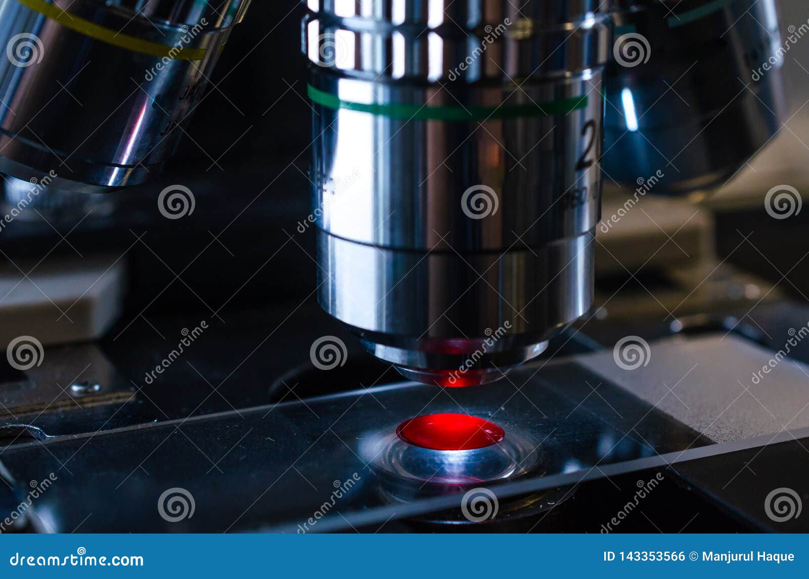 Examining Blood Sample Under Microscope Stock Photo - Image of analysis ...