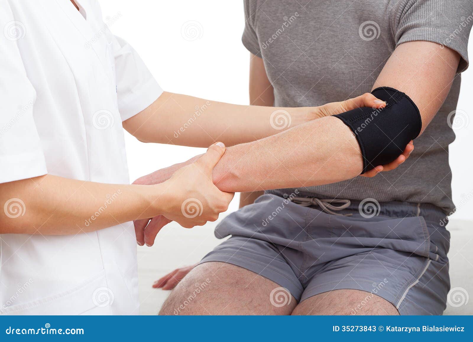 Examination of elbow stock image. Image of medical, chiropractor - 35273843