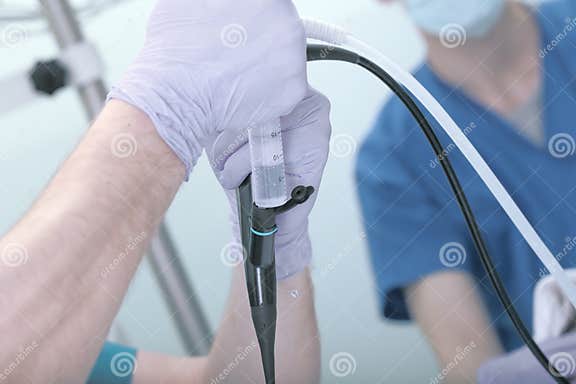 Examination of the Patient Using a Probe Stock Photo - Image of ...