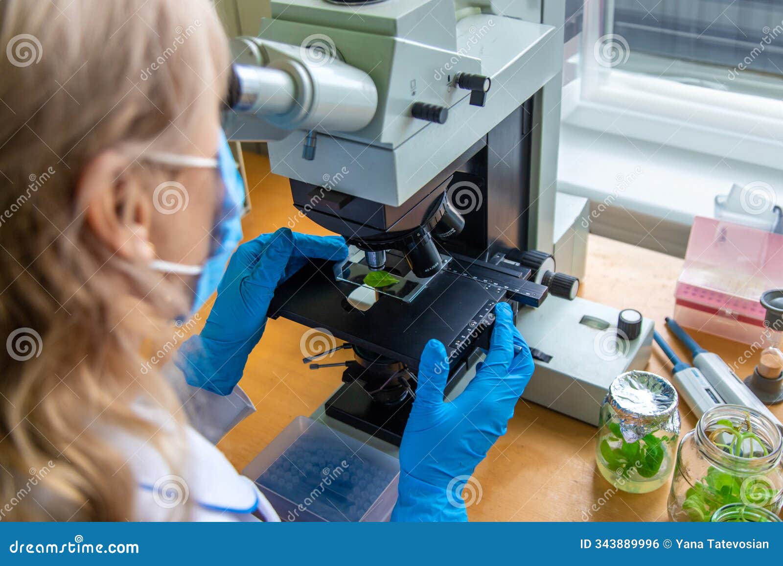 Examine in the Laboratory Under a Microscope. Selective Focus Stock Photo - Image of doctor ...